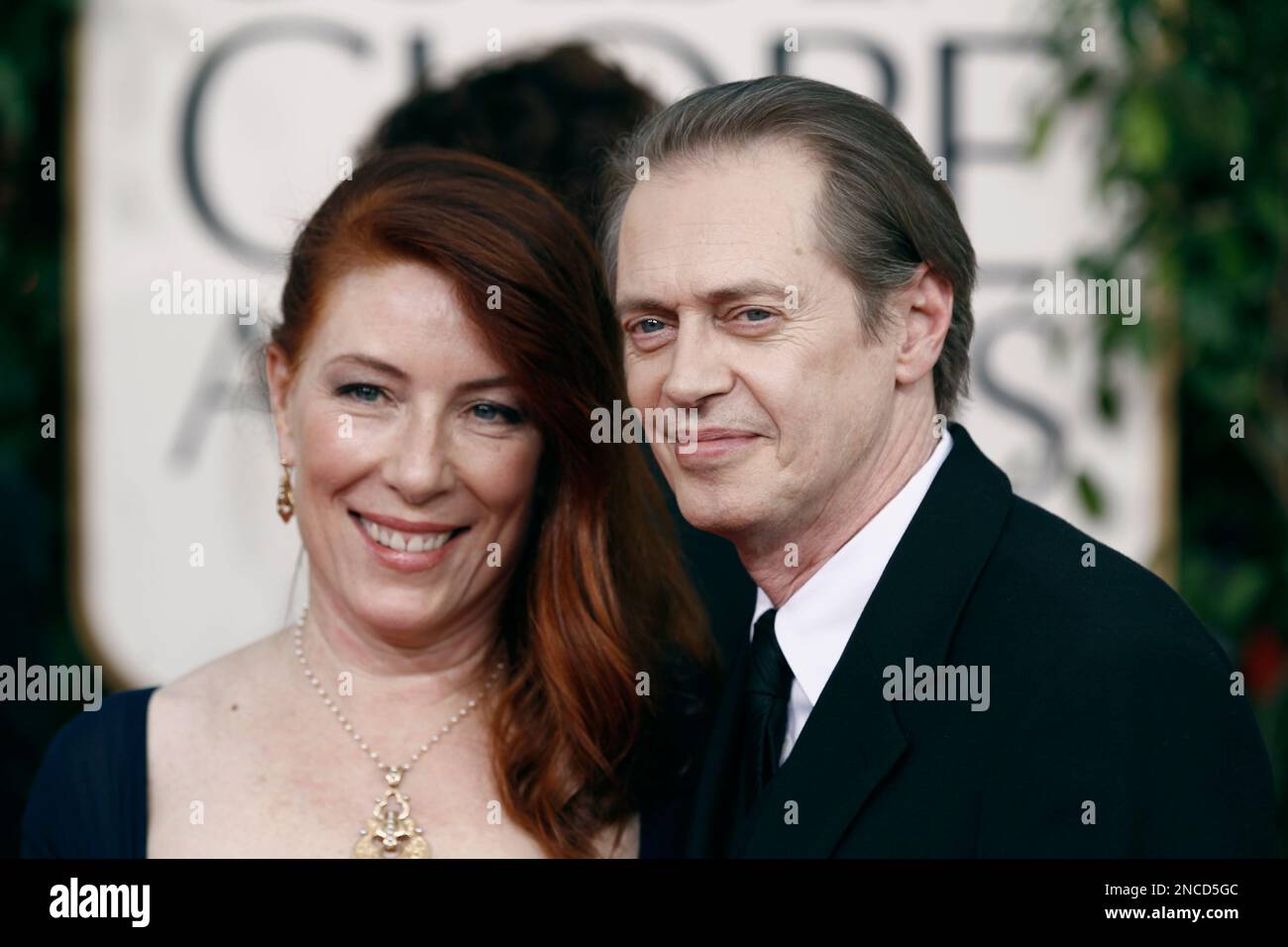 Steve Buscemi and Jo Andres arrive at the Golden Globe Awards Sunday ...