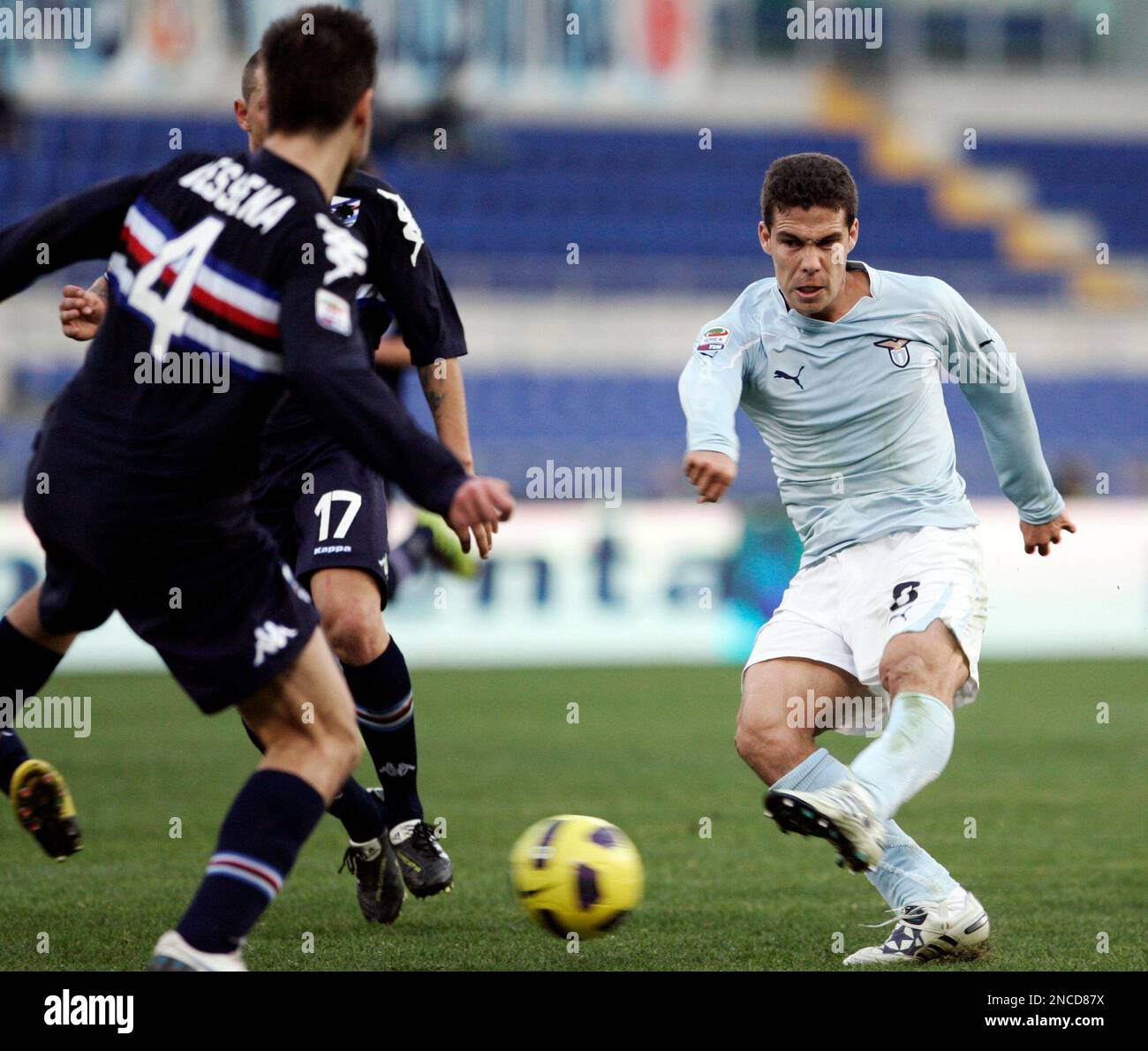 Lazio midfielder Hernanes, of Brazil, right, is challenged by Sampdoria midfielders Daniele ...