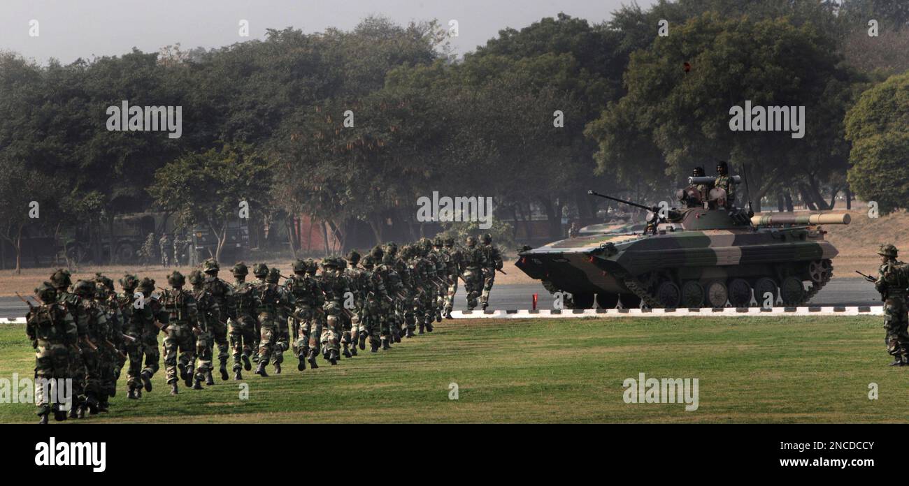 Indian Army soldiers stage a mock war drill during Army Day in New ...