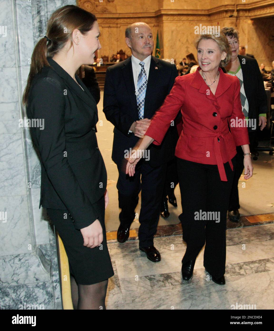Washington Gov. Chris Gregoire, right, her husband Mike, second from ...