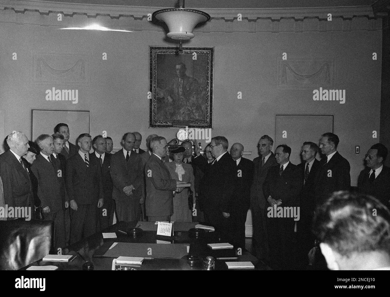 Harry S. Truman, (left center) is sworn in as President of the United ...