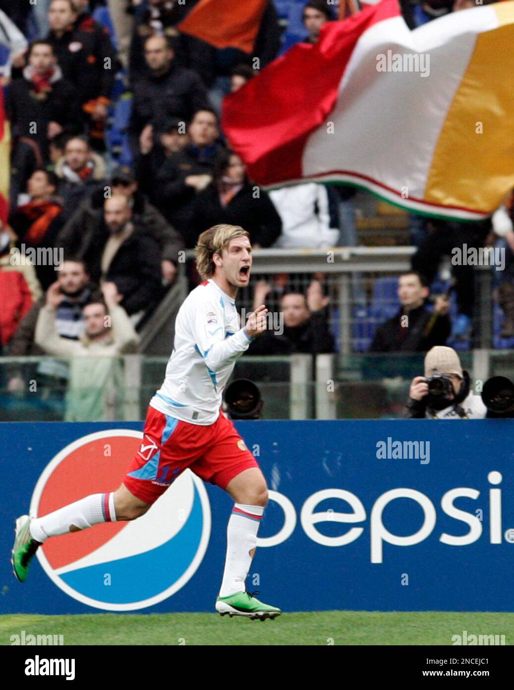 Catania Argentine forward Maxi Lopez celebrates after scoring during a ...