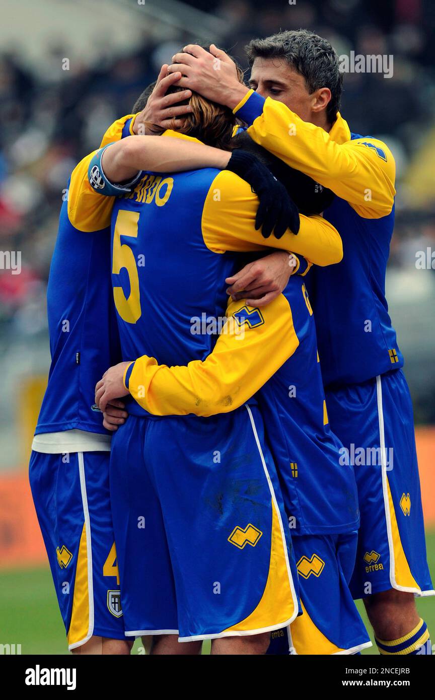 Parma players, including Cristian Zaccardo , foreground centre, and ...