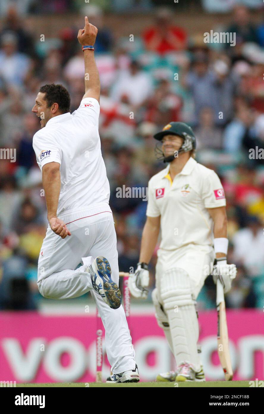 England's Tim Bresnan, left, celebrates taking the wicket of Australia ...