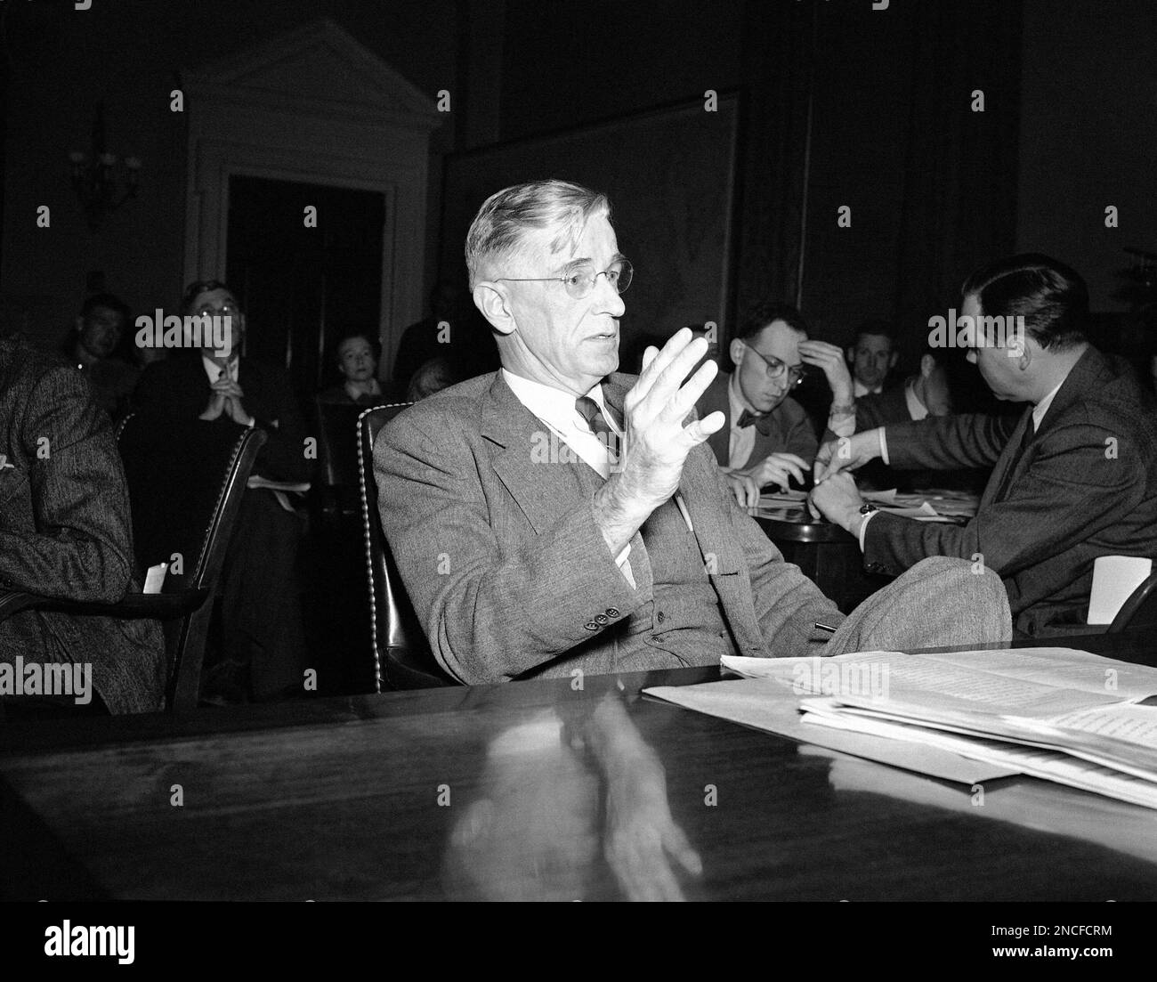 Dr. Vannevar Bush, left, head of the wartime Office of Scientific ...