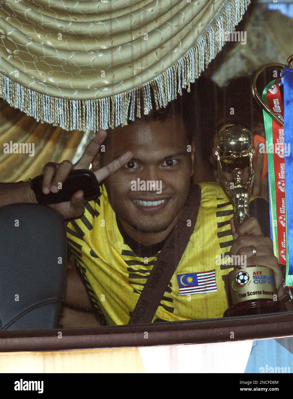 Malaysian soccer player Mohd Safee Mohd Sali smiles with the Top Scorer ...