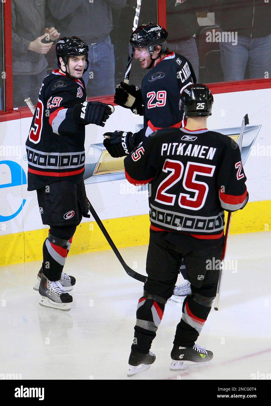 Carolina Hurricanes' Chad LaRose (59), Ryan Carter (29), and Joni ...