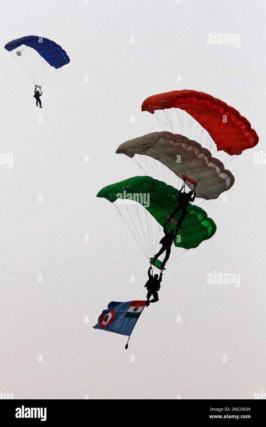 Indian army soldiers perform sky diving during a display ahead of ...