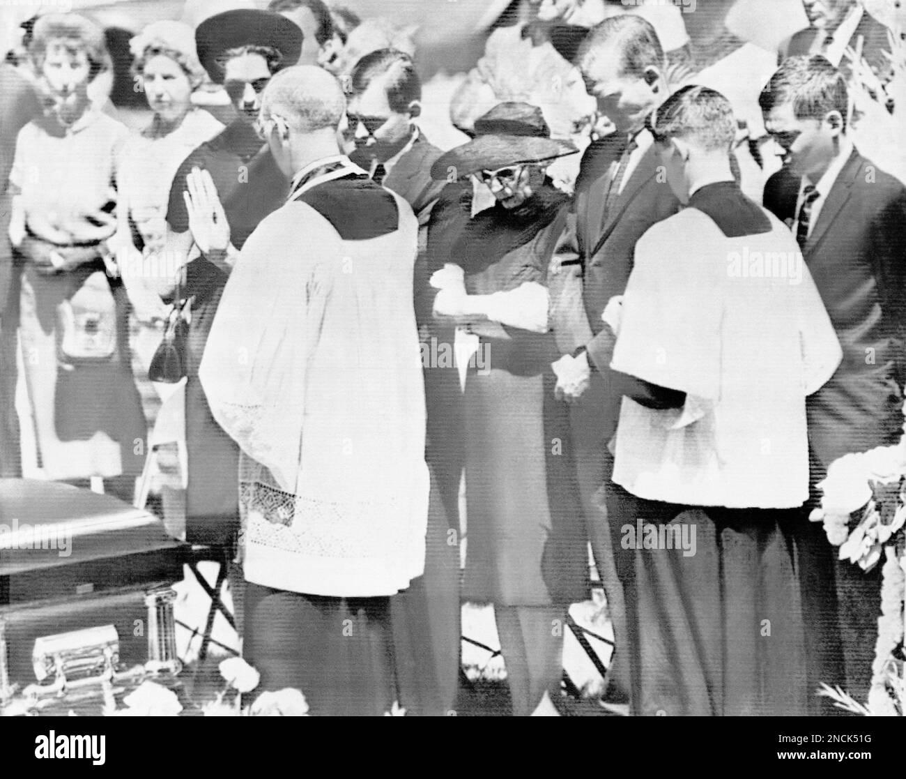 Mrs. Mary Hemingway, arms folded, widow of author Ernest Hemingway, and ...
