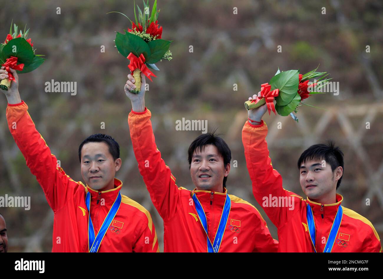 China's gold medalists from left, Pan Qiang, Hu Binyuan and Mo Junjie ...