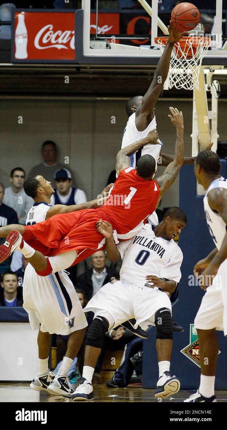 Boston University guard Darryl Partin (1) tries to get a shot past ...