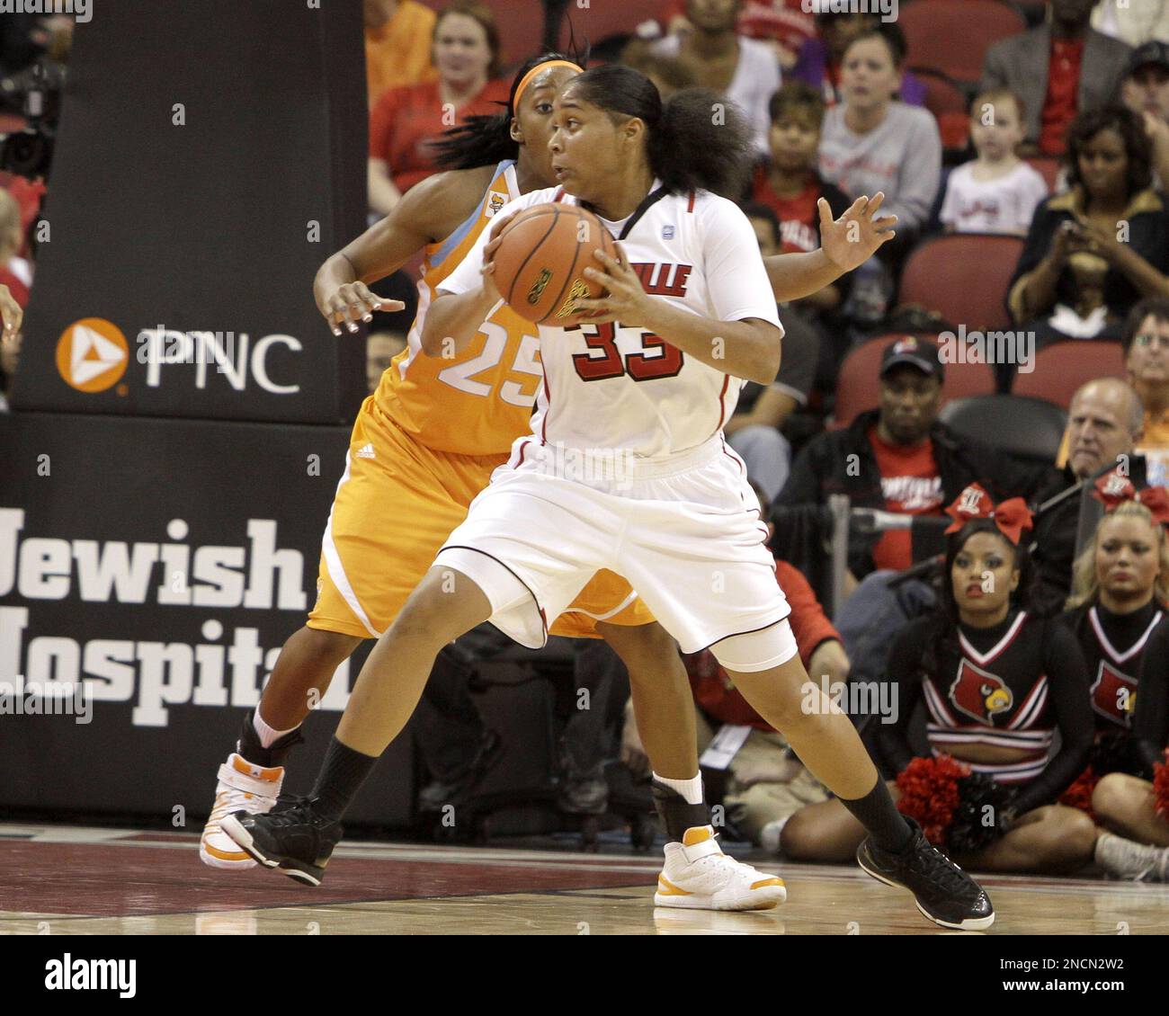 Louisville's Monique Reid (33) looks inside as Tennessee's Glory ...