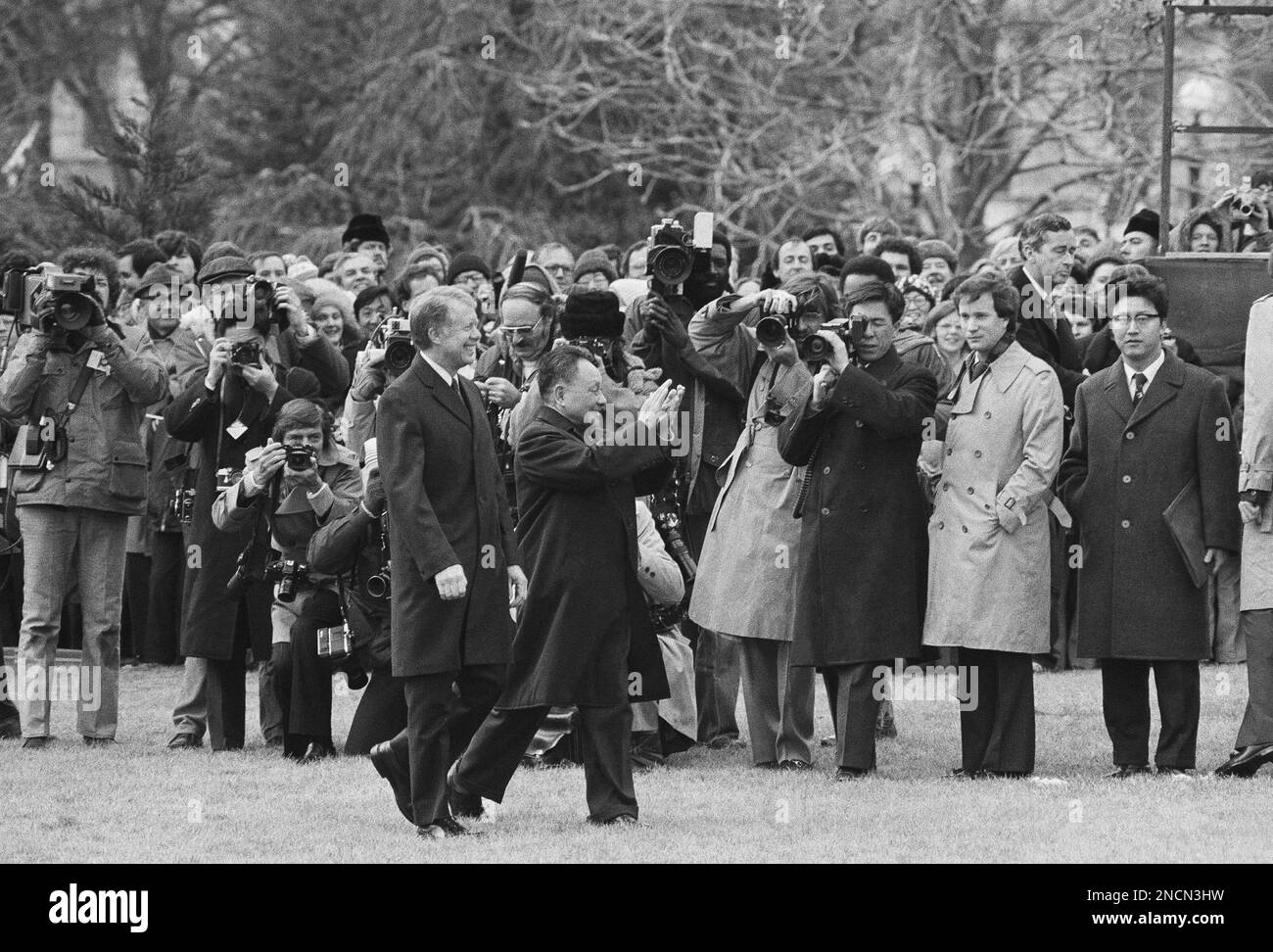 Chinese Vice Premier Teng Hsiao-Ping applauds as he and President Jimmy ...