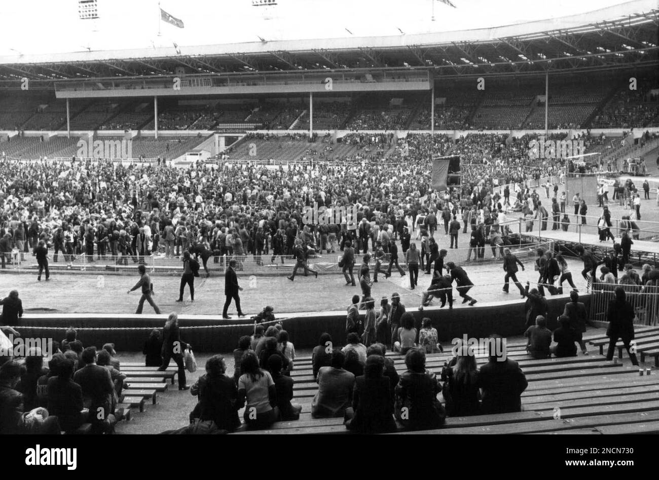 Wembley Stadium’s ‘sacred’ turf invaded by rock and roll fans attending ...