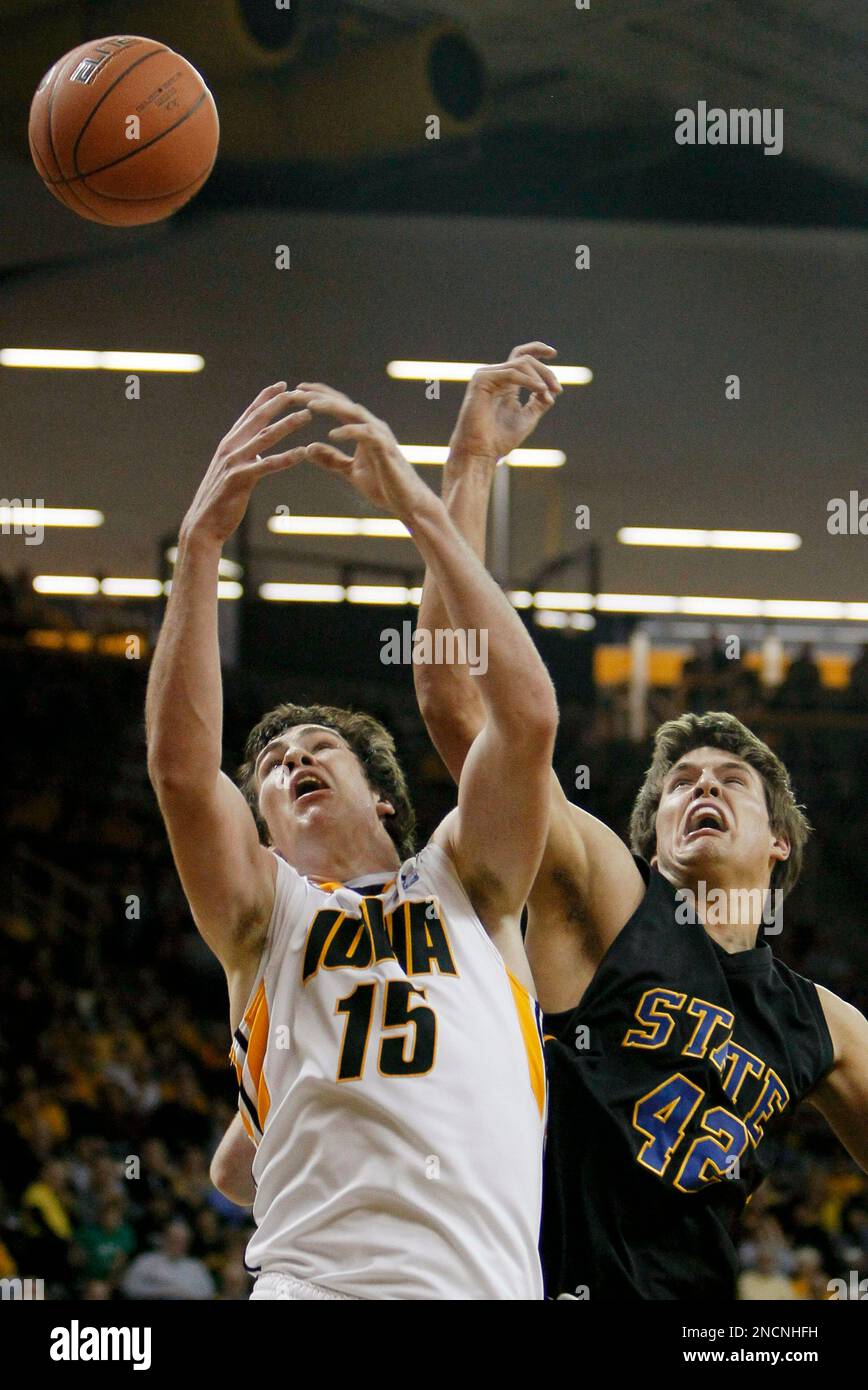 Iowa forward Zach McCabe (15) fights for a rebound with South Dakota ...