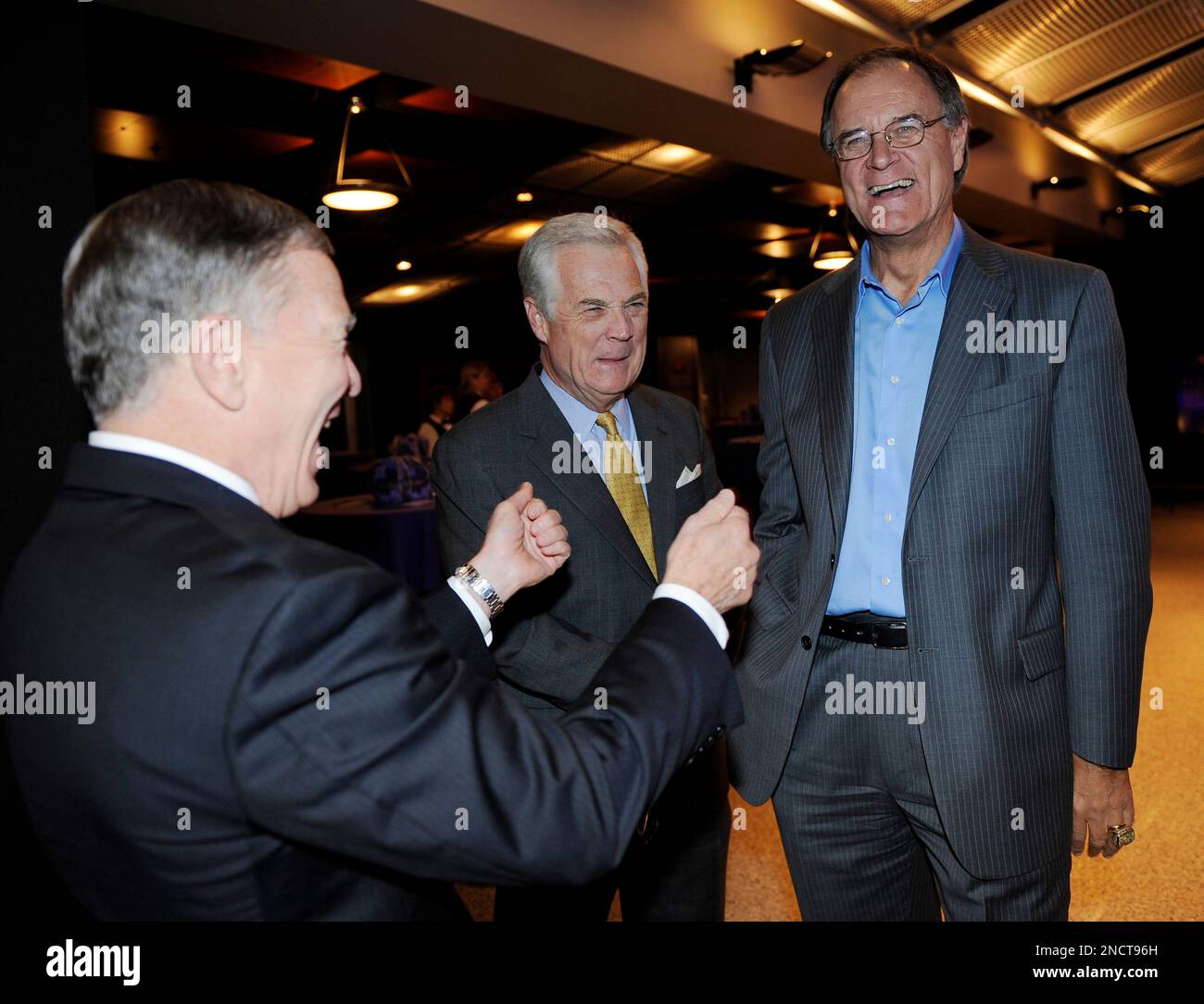 Former NFL football coach Brian Billick, right, laughs with Maj. Gen ...