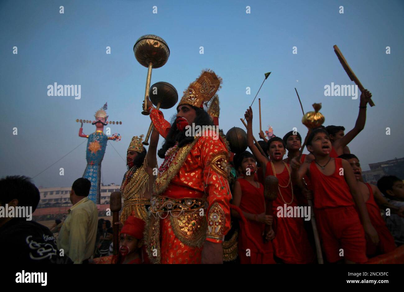 Children dresses up as Hindu gods shout religious slogans near an ...