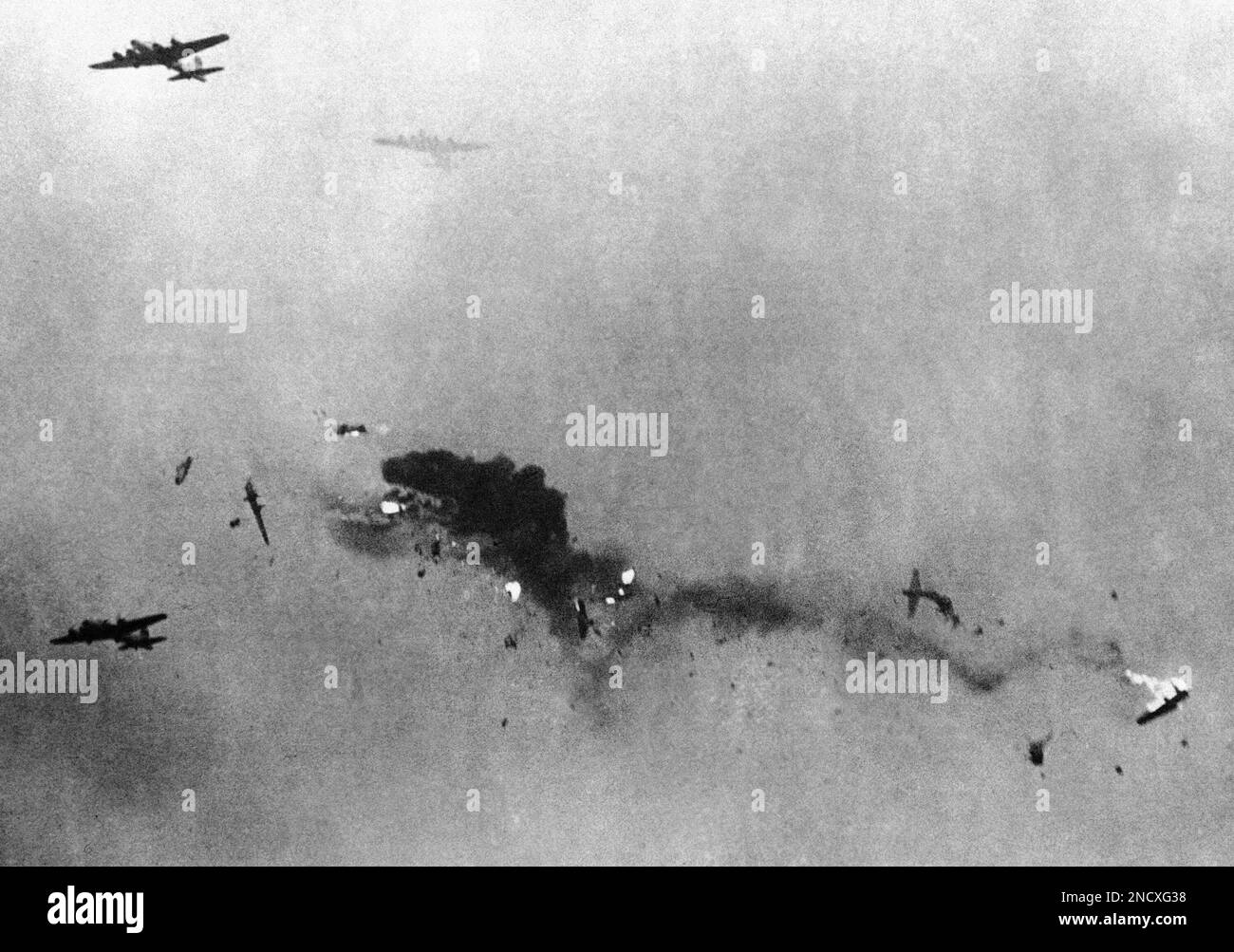 Debris from two Flying Fortresses of the U.S. Eighth Air Force fills ...