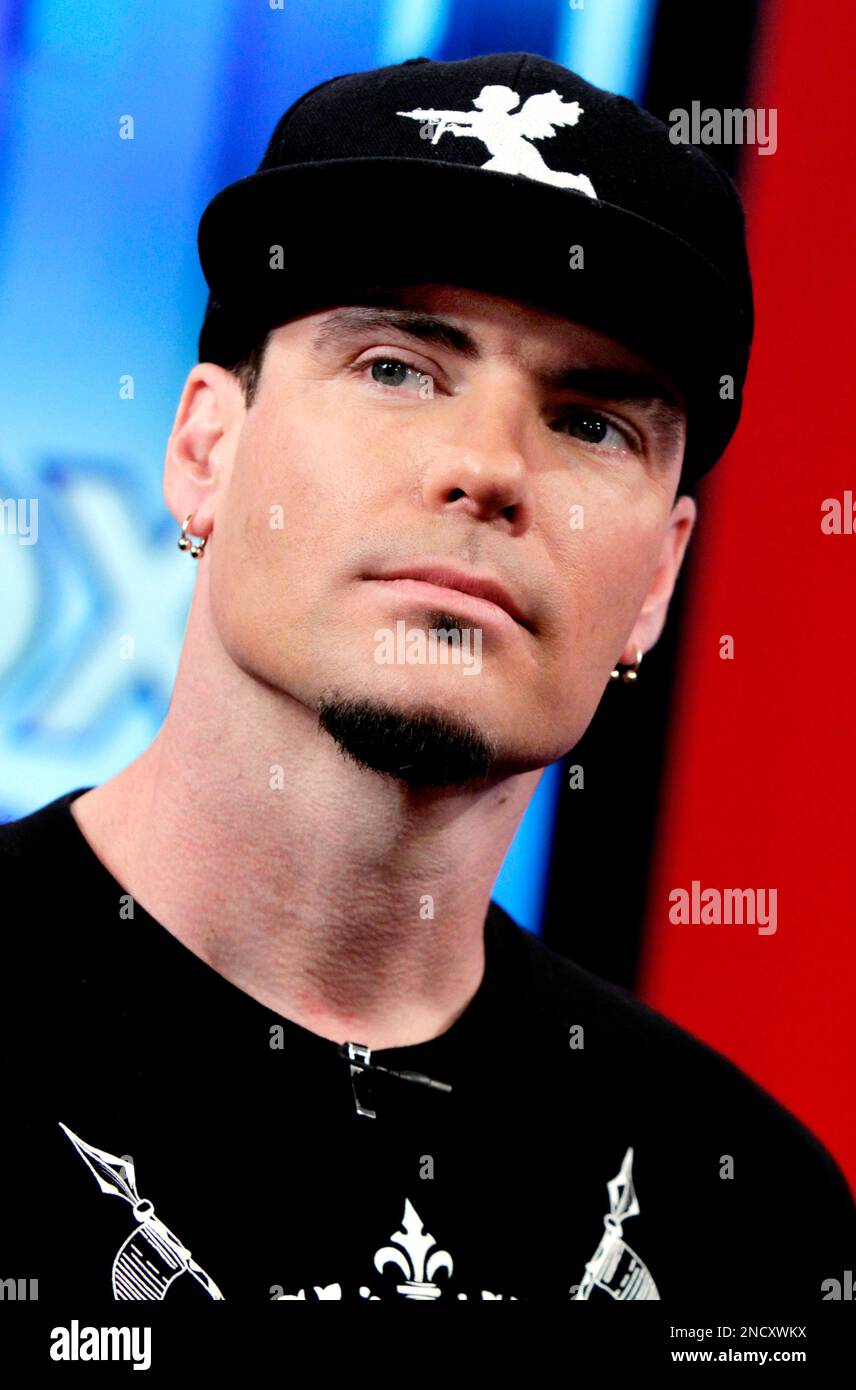 Rob Van Winkle, left, also known by his stage name Vanilla Ice, waits for interview on the "Fox ...