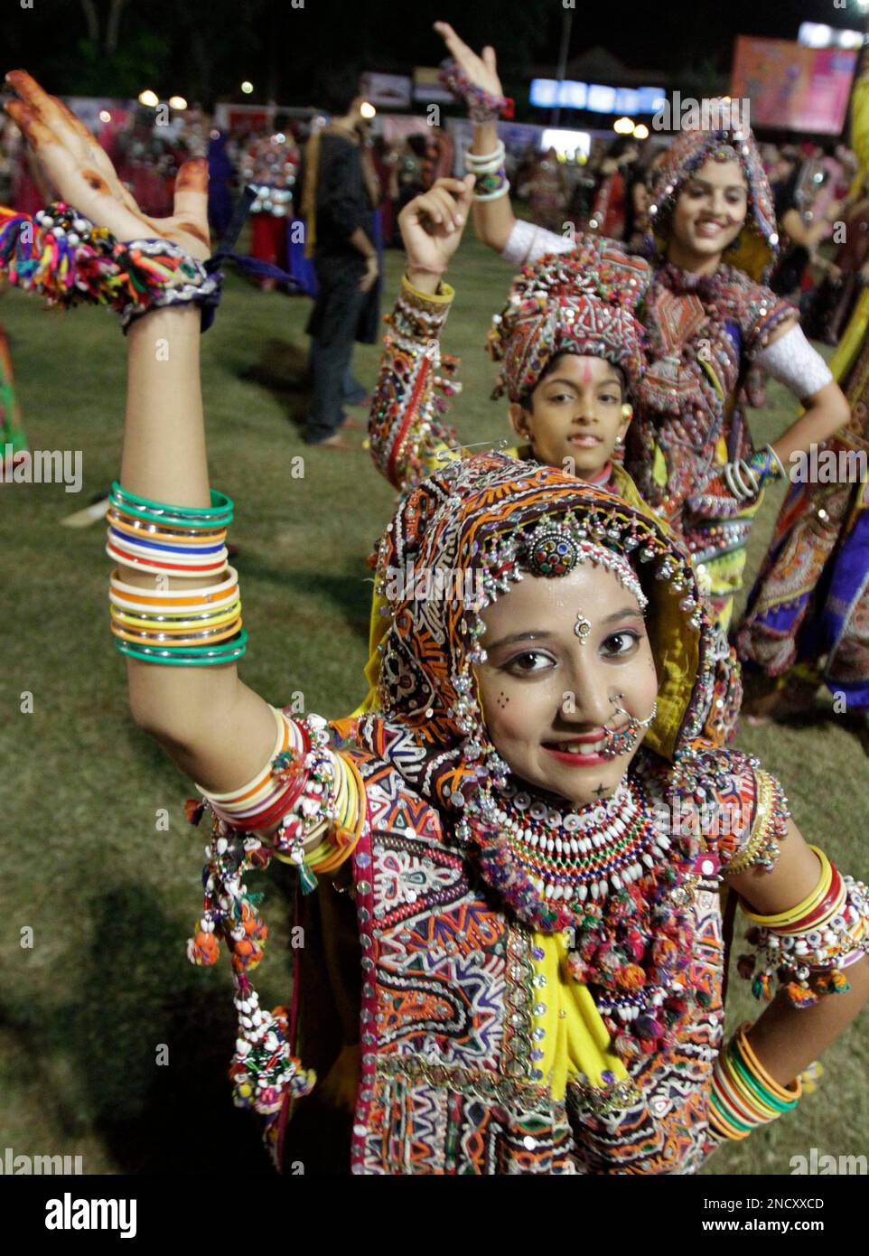 This Monday, Oct. 11, 2010 photo shows Indians wearing traditional ...