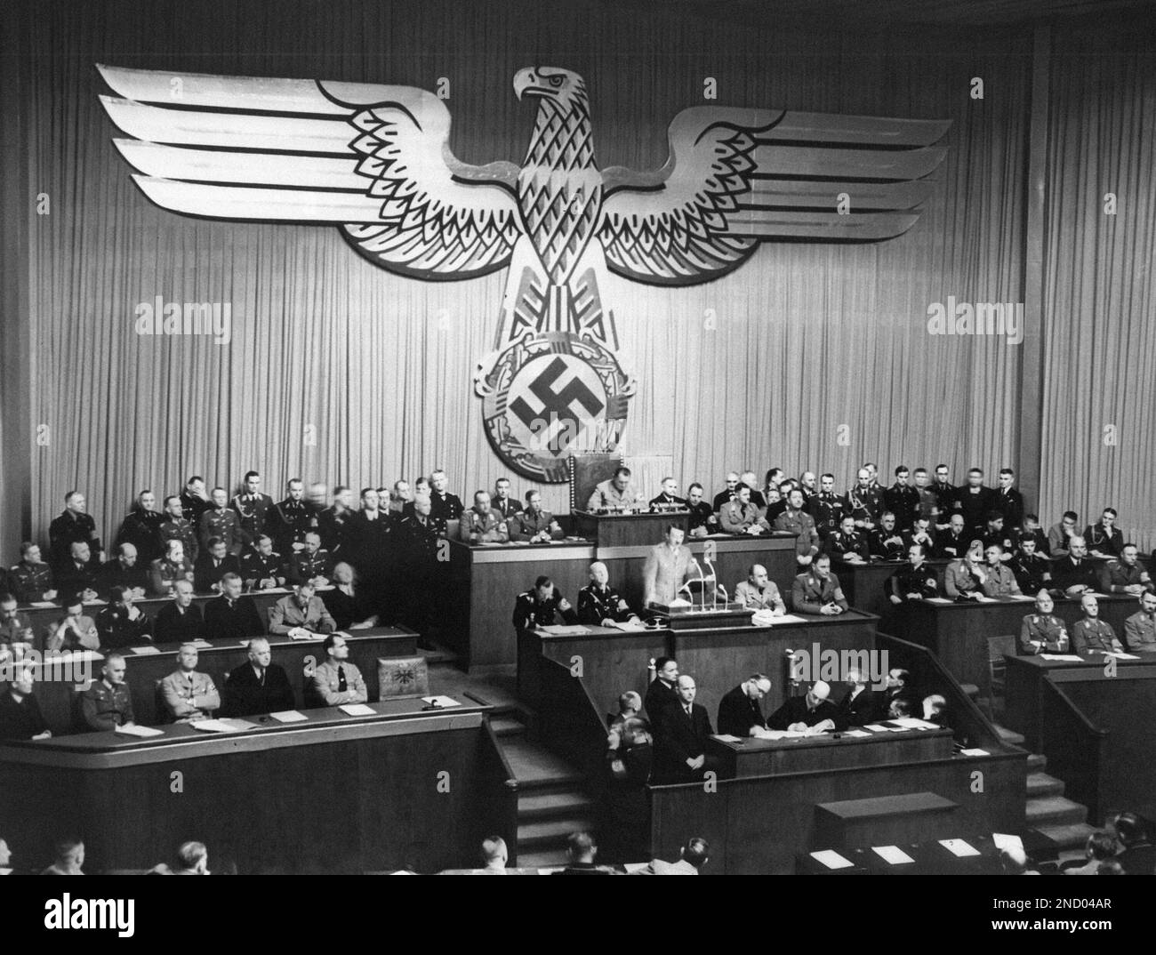 Adolf Hitler, center, addressing the Reichstag, Jan. 30, 1937, seated ...