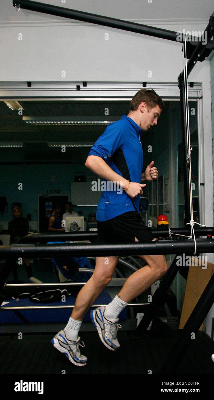 British middle distance runner Colin McCourt runs on a machine for a ...