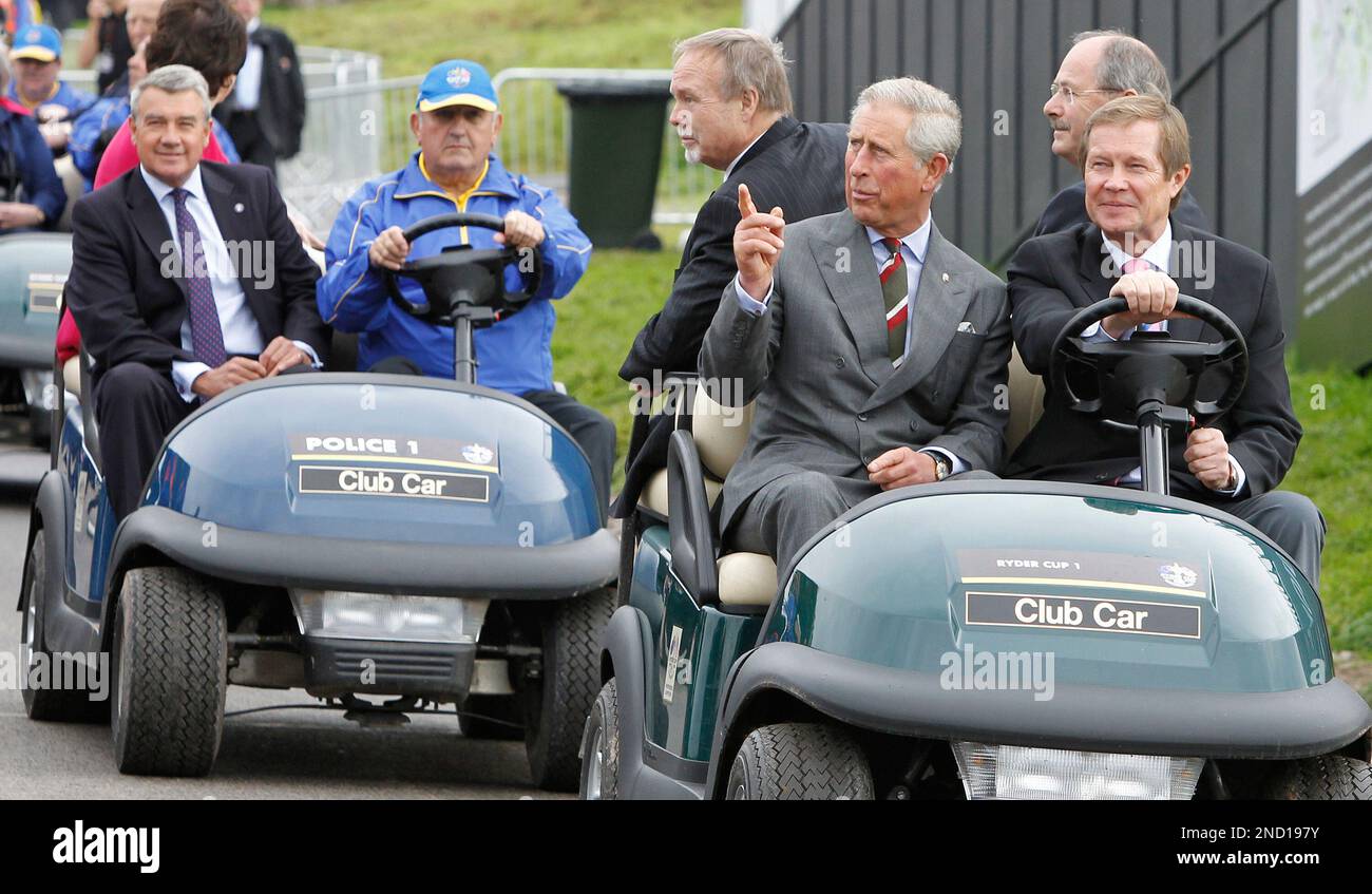 Britain's Prince Charles, third right, and Sir Terry Matthews, fourth ...