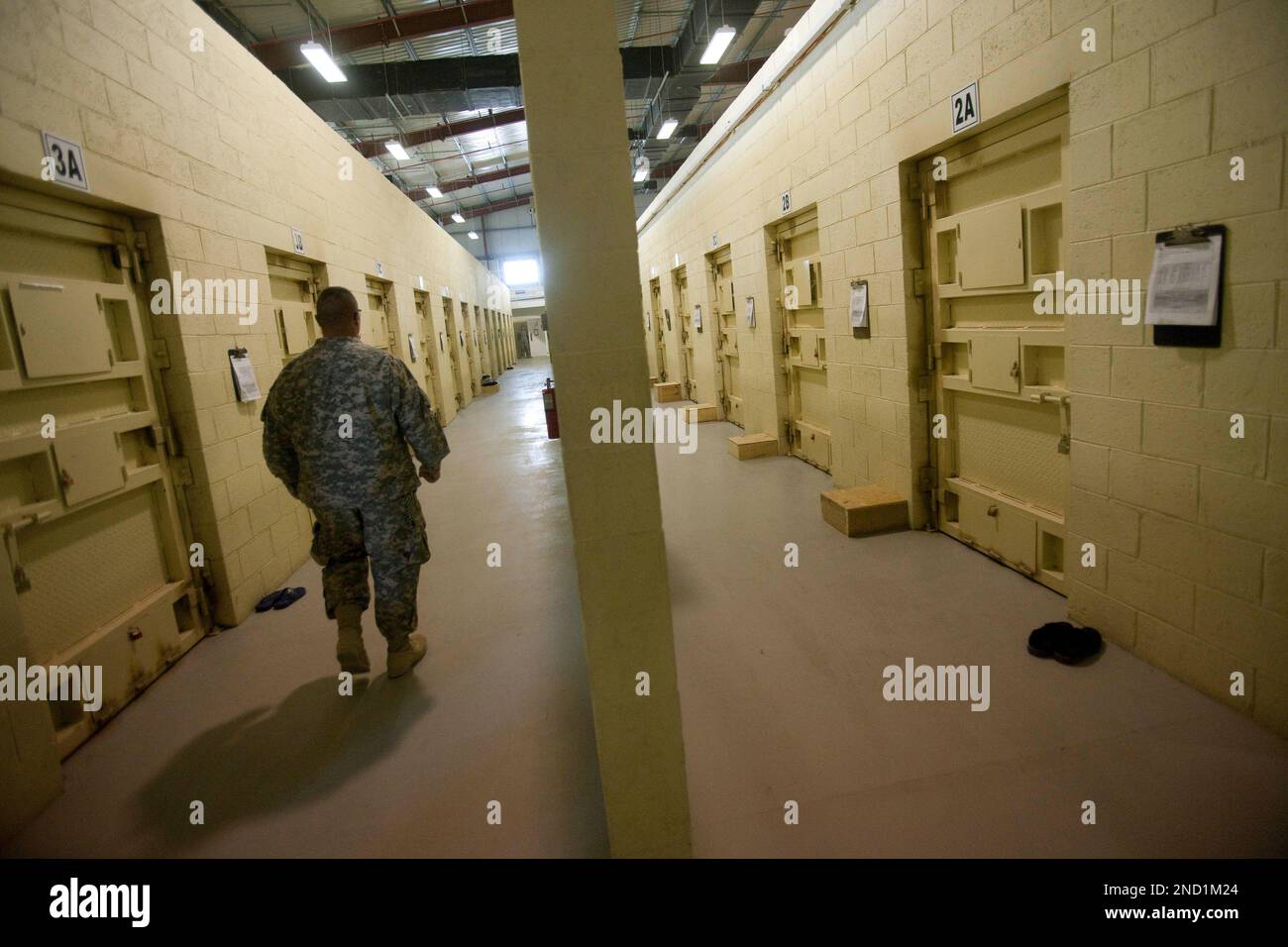 In this photo reviewed by the U.S. military, a U.S. military guard ...