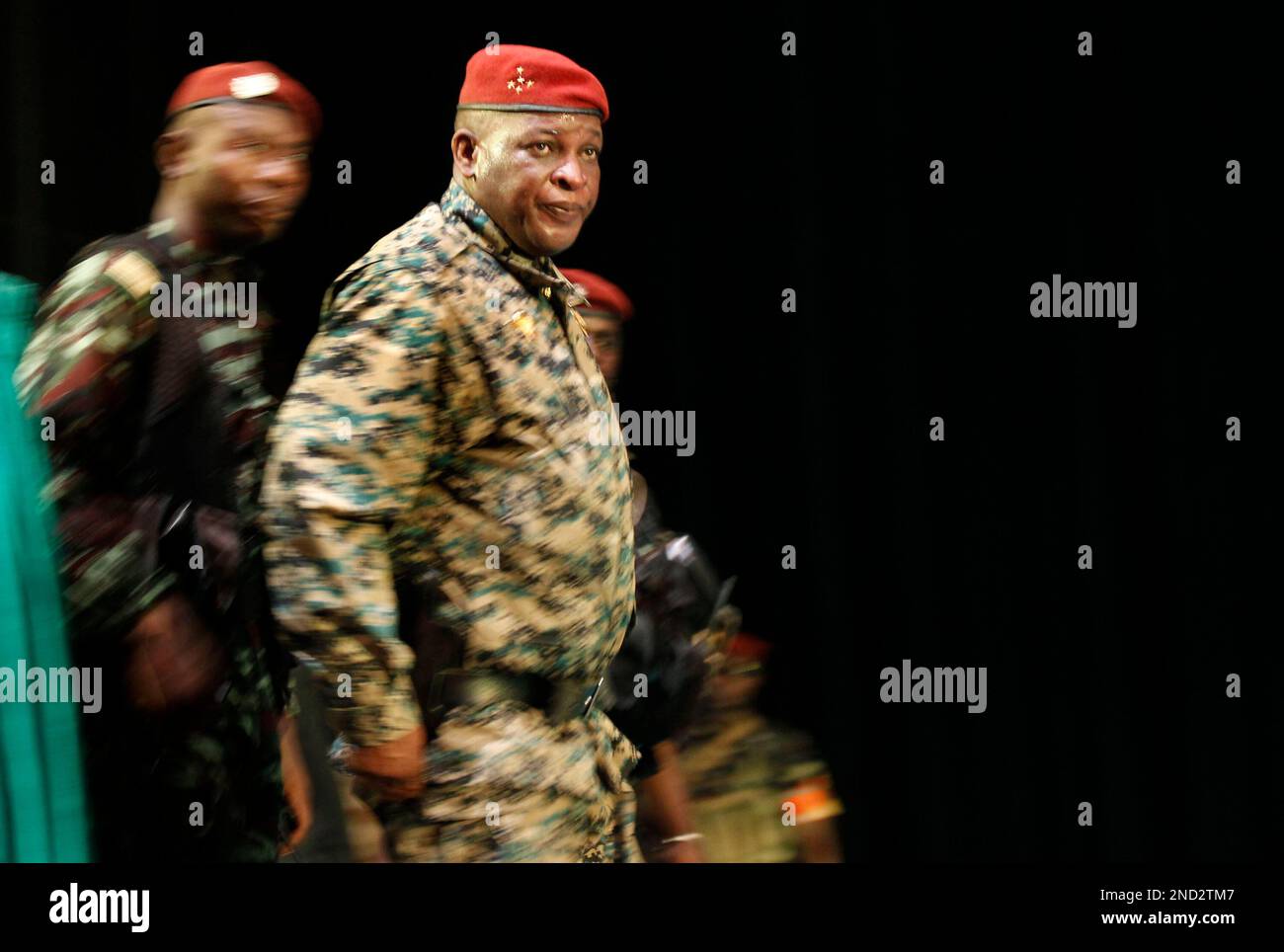 Guinea acting President General Sekouba Konate walks off the podium ...