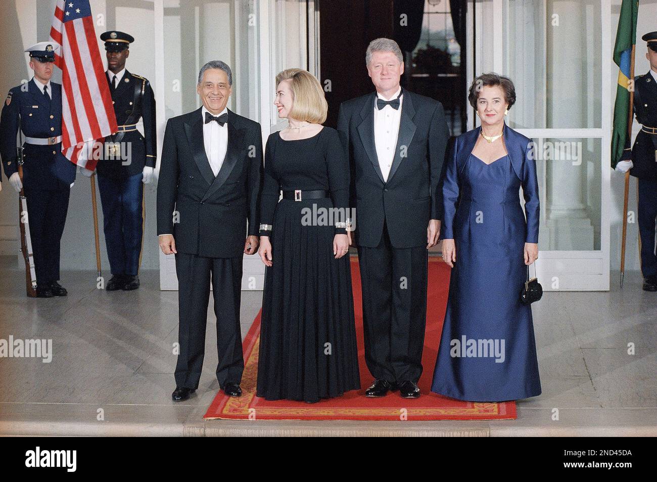 President Bill Clinton and first lady Hillary Rodham Clinton pose with ...