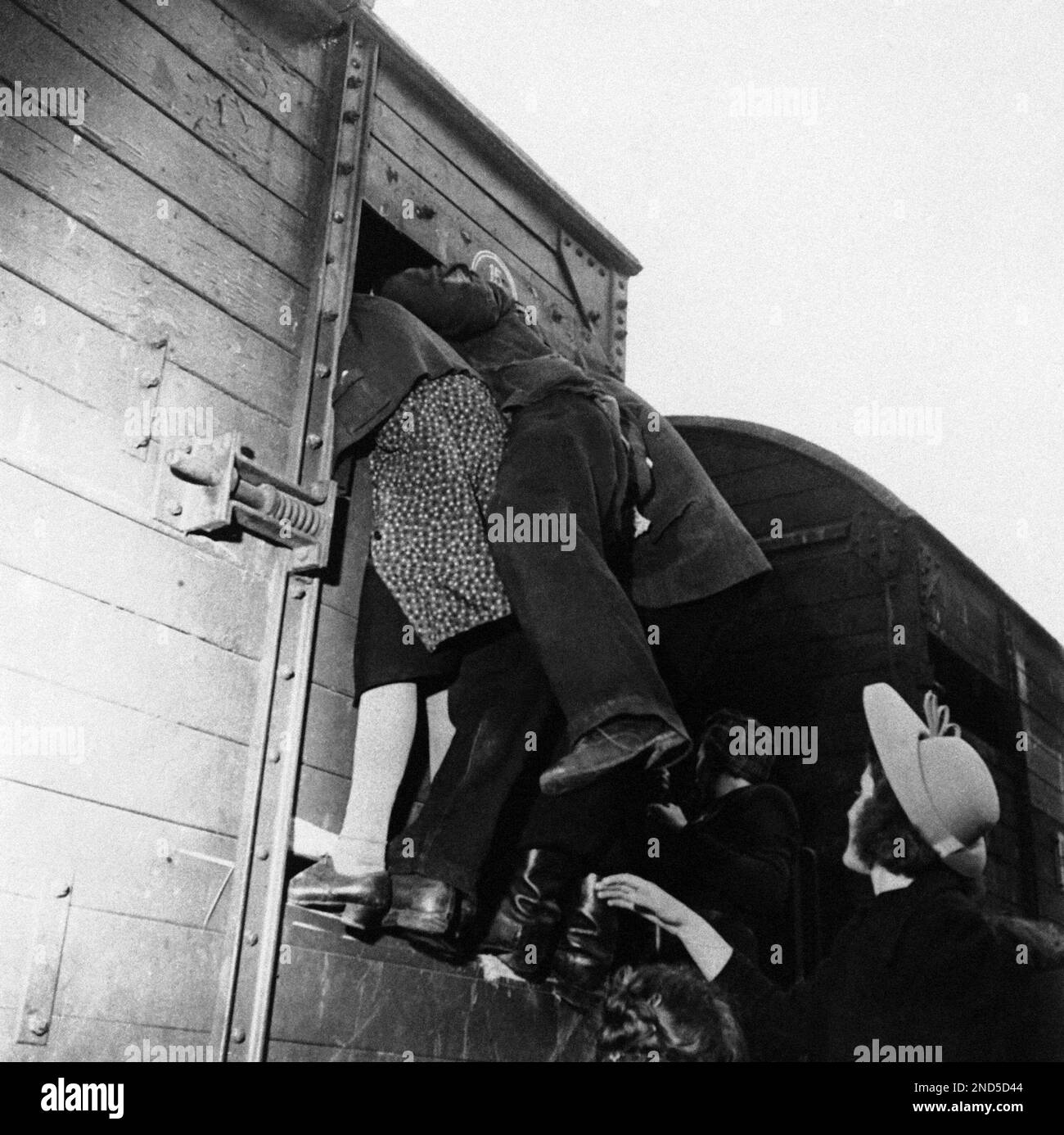 As Nazi troops retreated from the town of Darmstadt, Germany, civilians ...