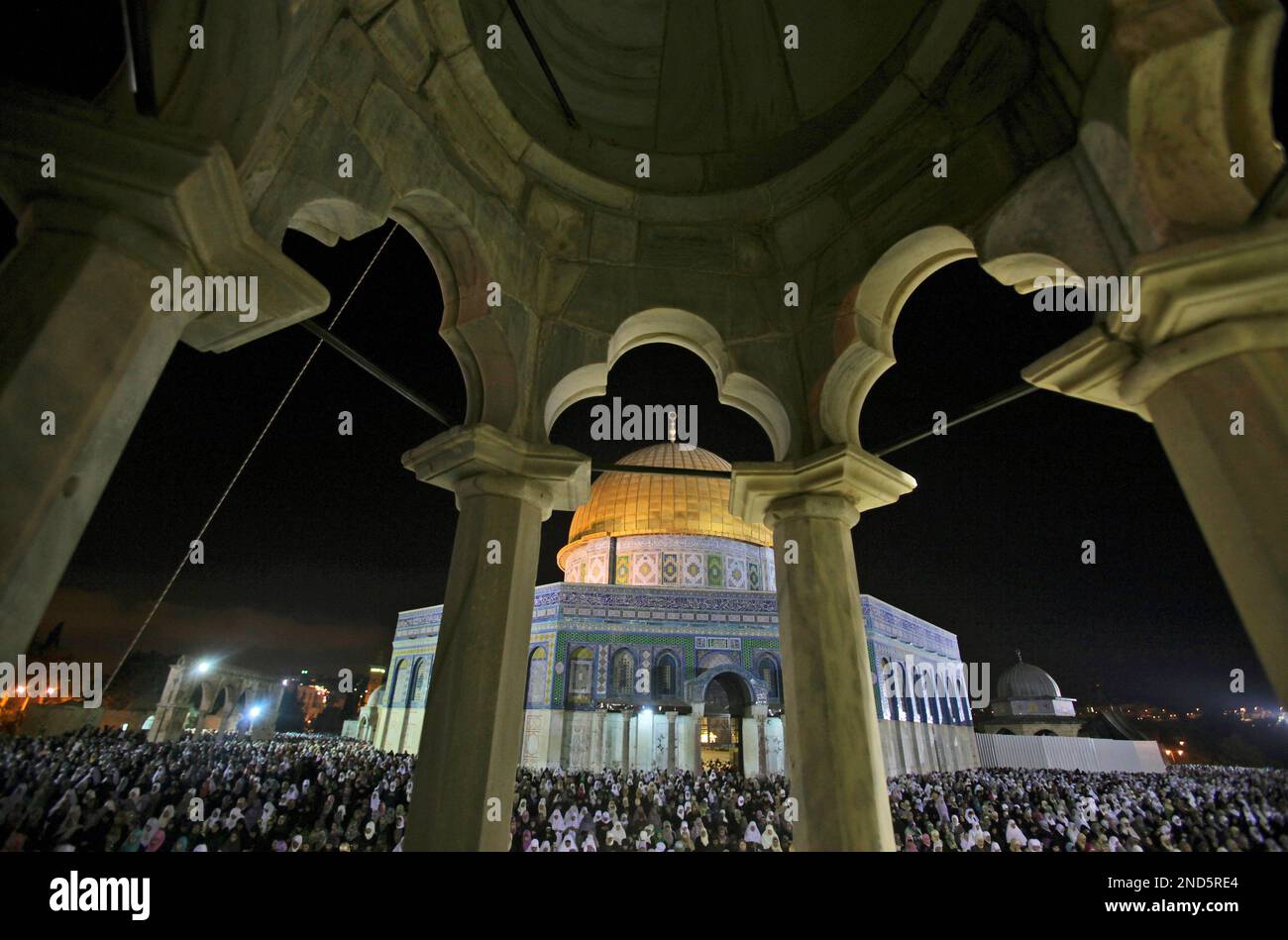Palestinian Muslim worshipers pray during Laylat Al Qadr, also known as ...