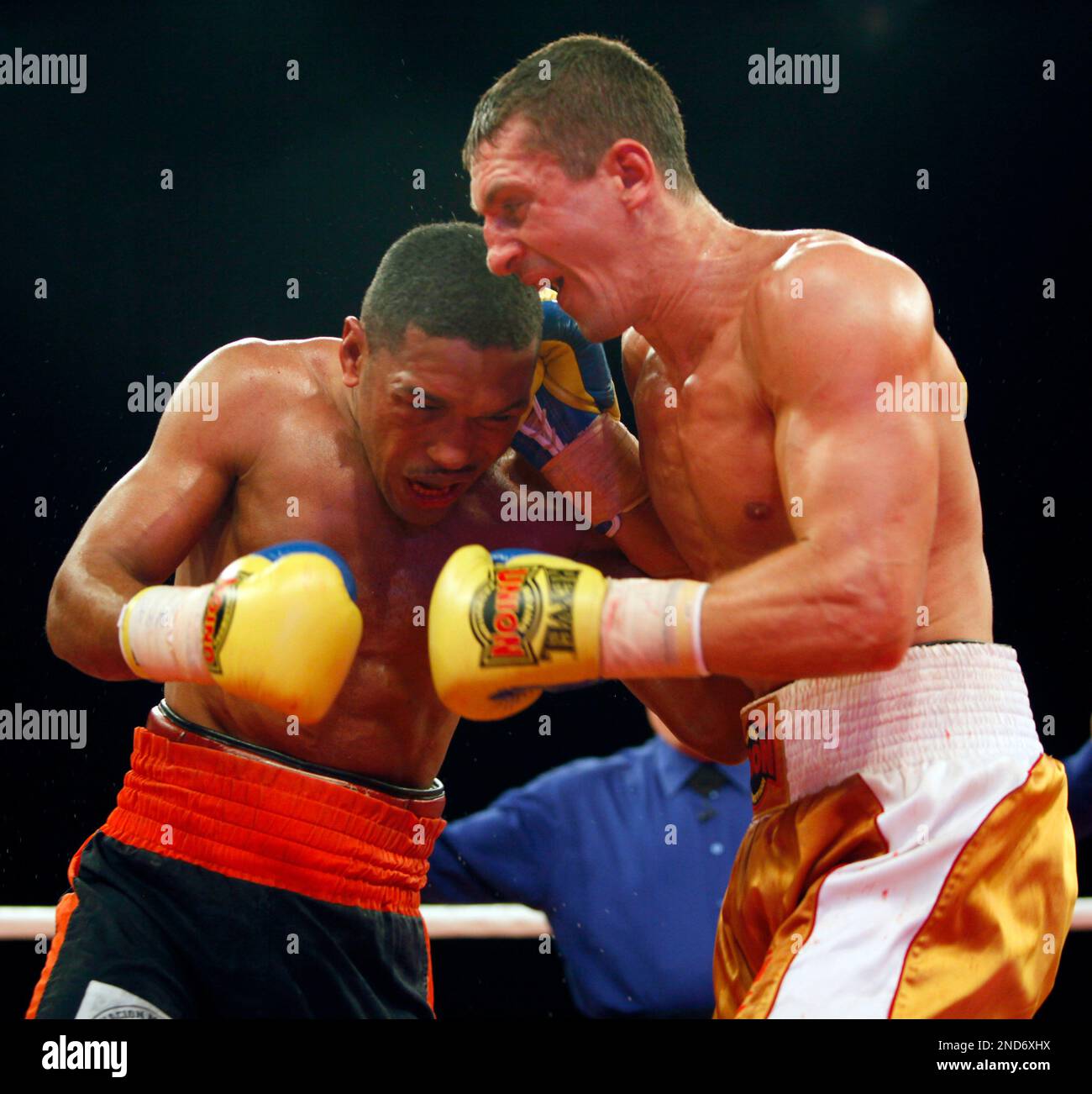 WBA world champion Vyacheslav Senchenko , right, of Ukraine throws a ...