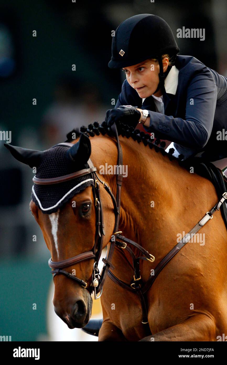 Athina Onassis, riding AD Ricardo, competes in the 1.45 meter jumping ...