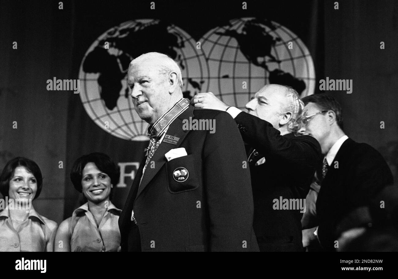 Outgoing FIFA chairman Sir Stanley Rous, is awarded the West German ...