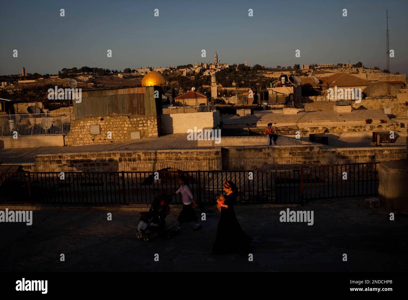 Back dropped by the Dome of the Rock Mosque, in the Al Aqsa Mosque ...