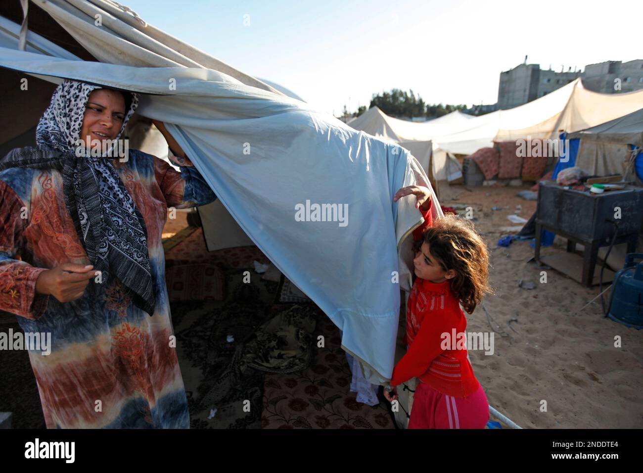 ** FOR RELEASE MONDAY, JULY 19 ** Palestinian Wafa Awaja, 34, stands ...
