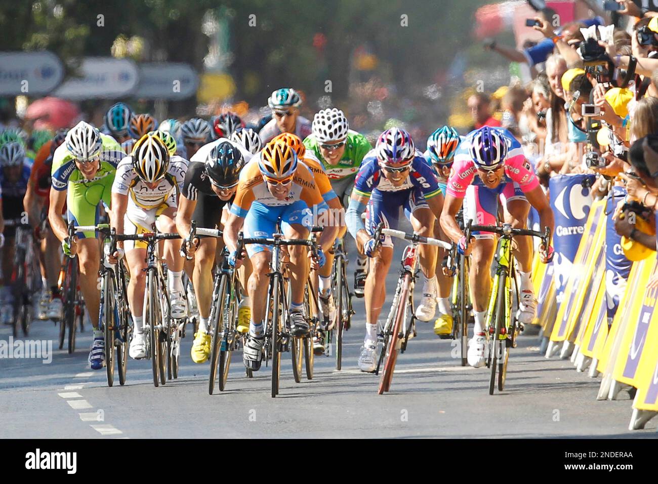 Stage winner Alessandro Petacchi of Italy, right, Robbie Mc Ewen of ...