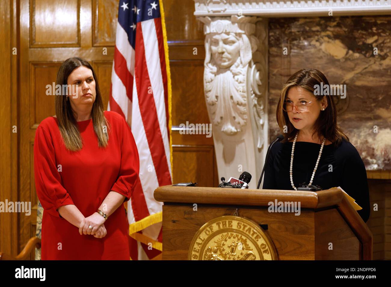 Kristi Putnam, right, secretary of the Arkansas Department of Human ...