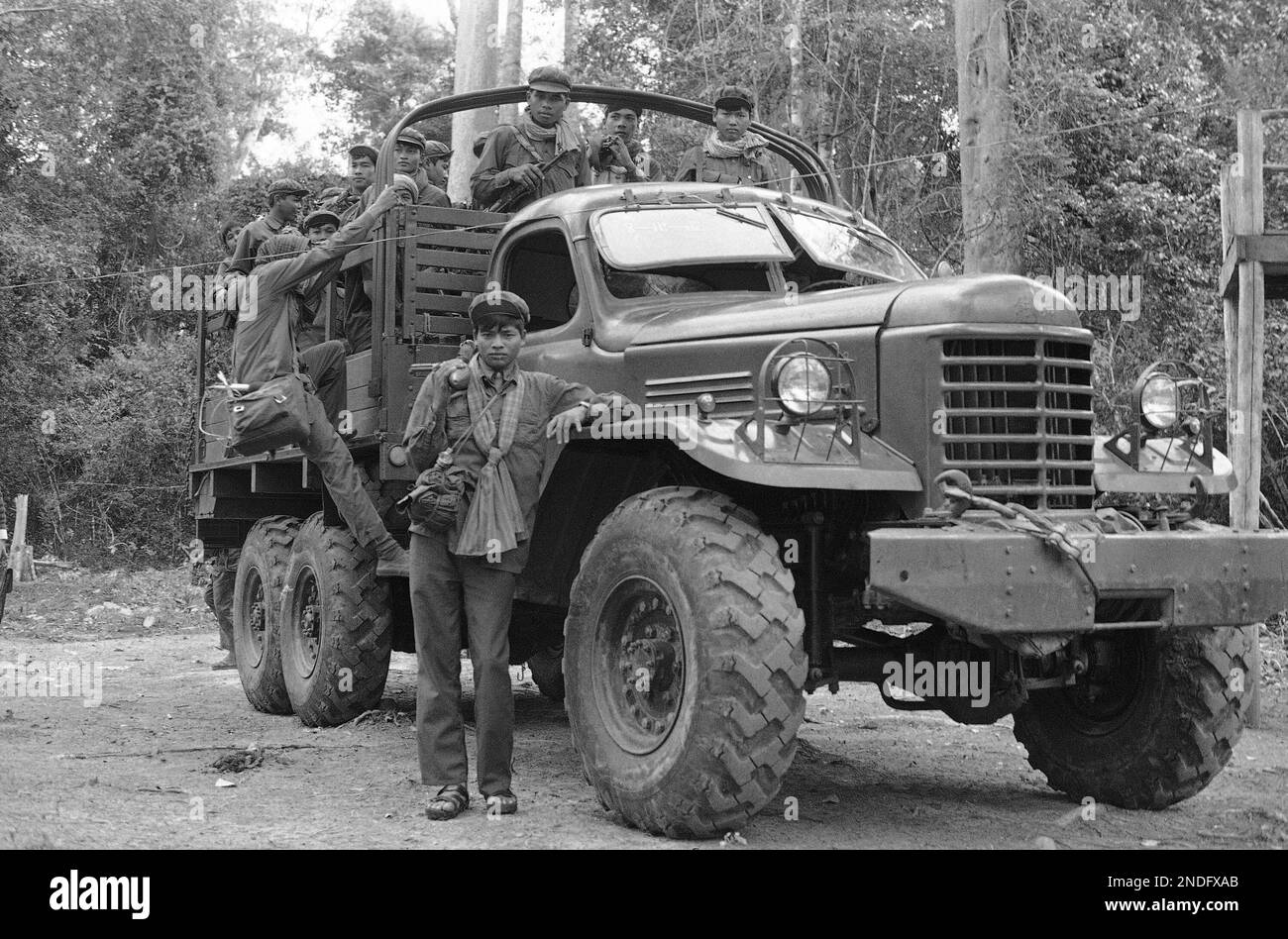 Khmer rouge soldiers pose on a Chinese-made truck in Western Cambodia ...