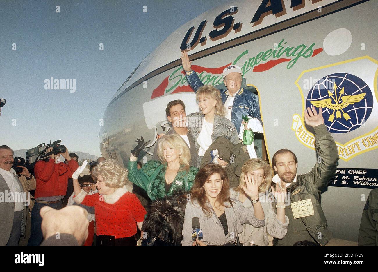 Comedian Bob Hope is joined by members of his 76-member troupe in Van ...