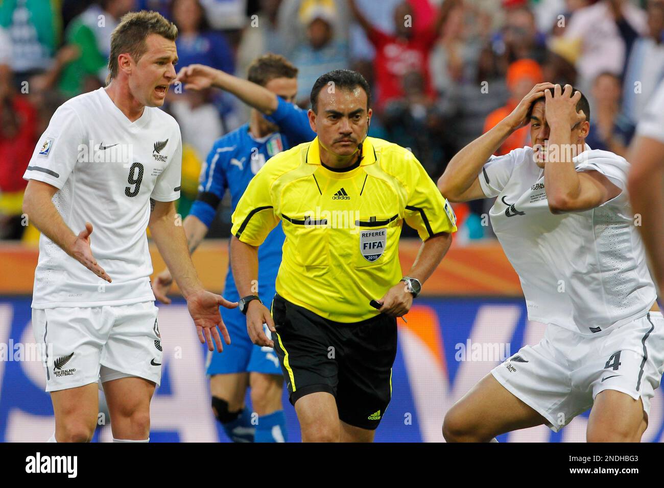 New Zealand's Shane Smeltz, left, and New Zealand's Winston Reid, right ...
