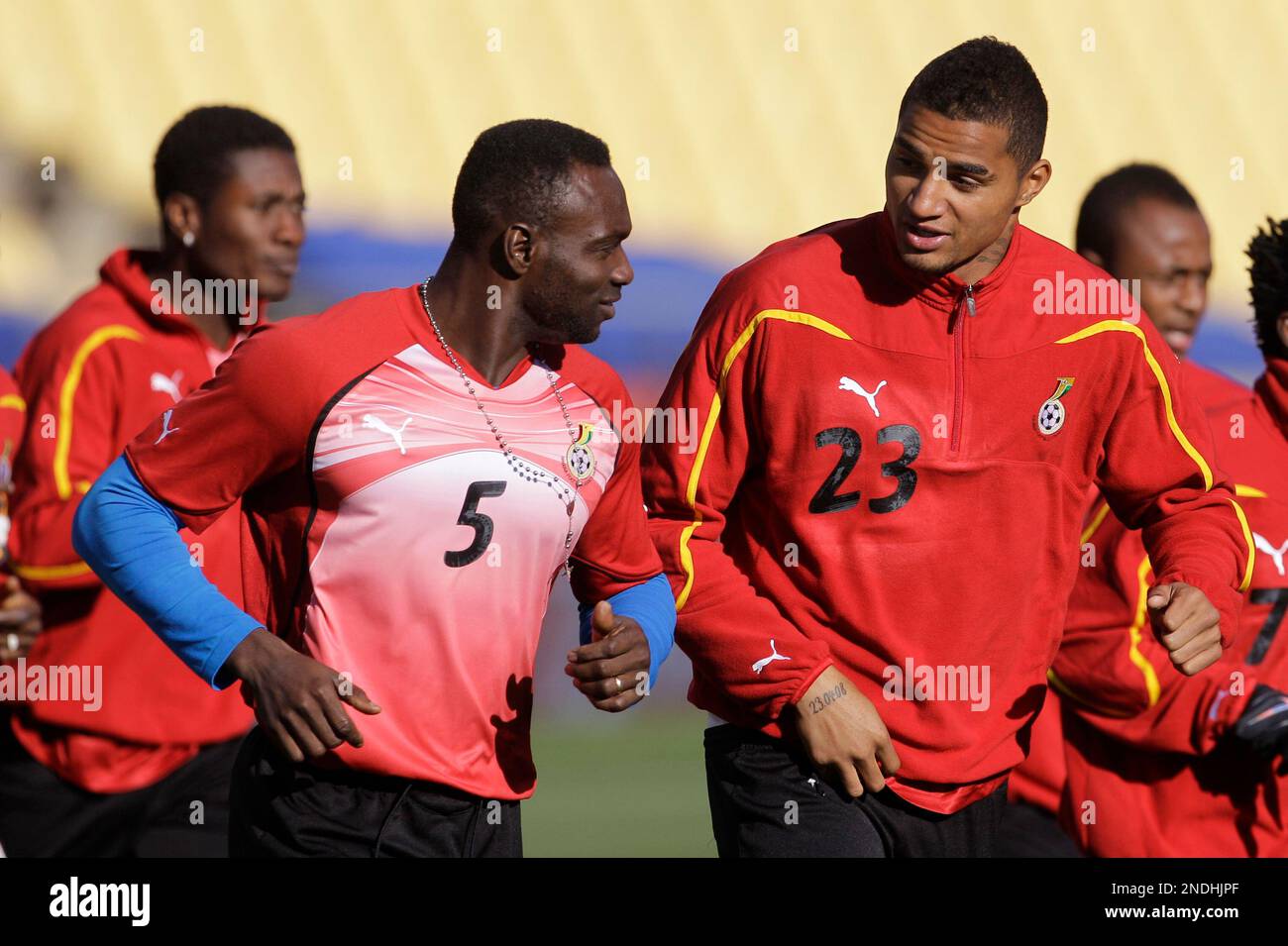 Ghana's Kevin-Prince Boateng, right, talks with teammate John Mensah as ...