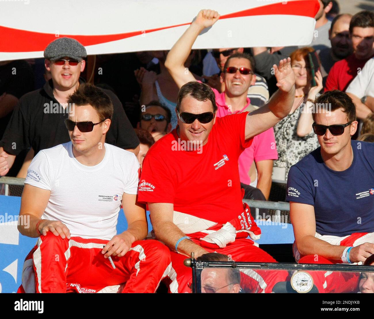 Former world champion of Formula 1 Nigel Mansell, center, with his sons ...