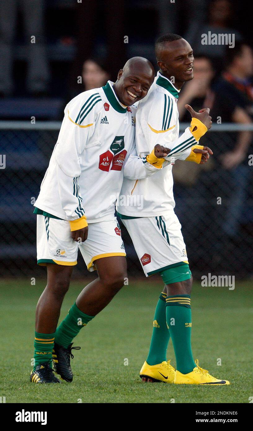 South Africa's Lucas Thwala, left, jokes with teammate Siboniso Gaxa ...