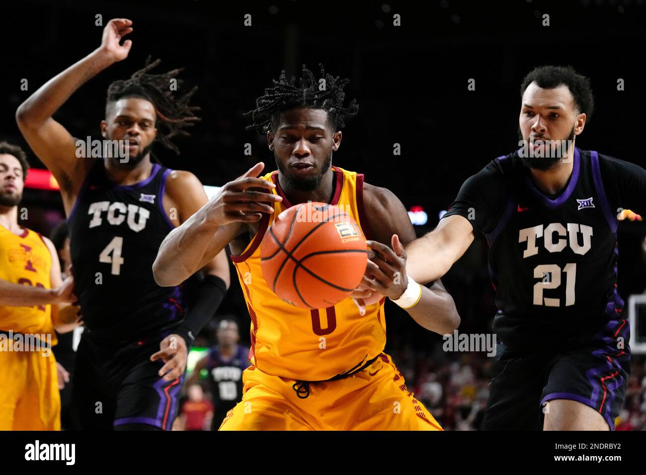 Iowa State forward Tre King (0) fights for a loose ball with TCU center ...