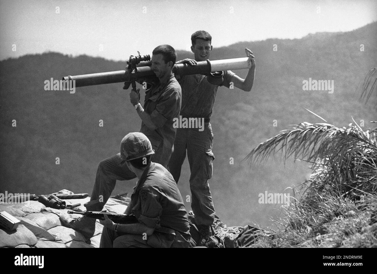 A 106mm recoilless rifle crew readies to fire a test burst from a ...