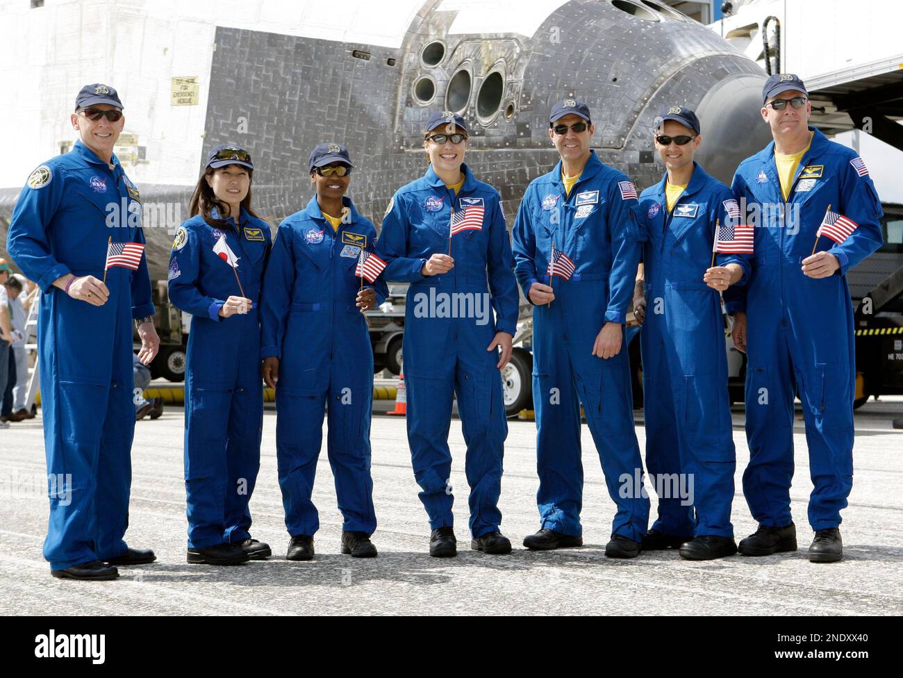 The crew of space shuttle Discovery, from left, mission specialist ...