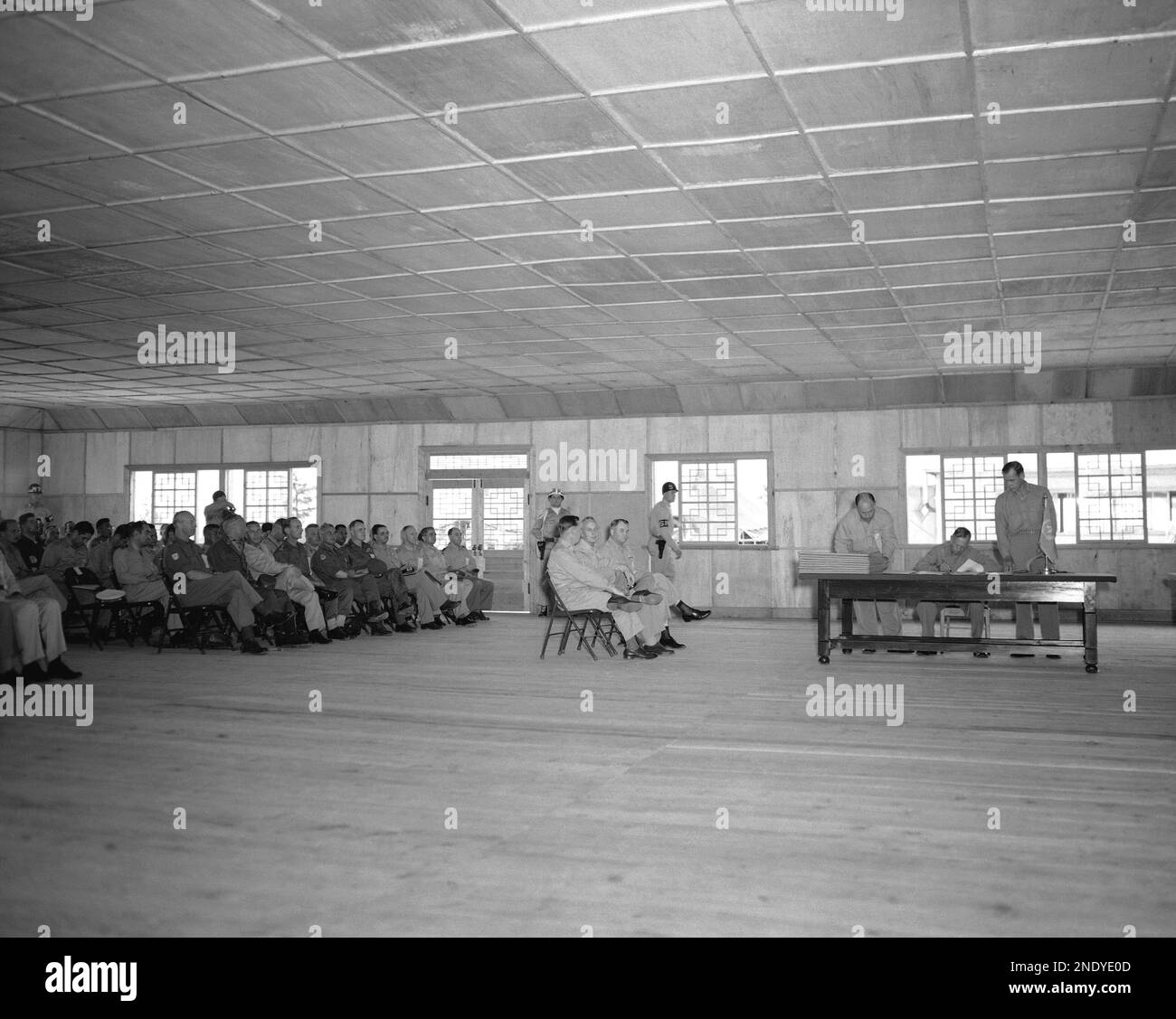 U.N. witnesses, including armed services officials and newsmen, watch ...