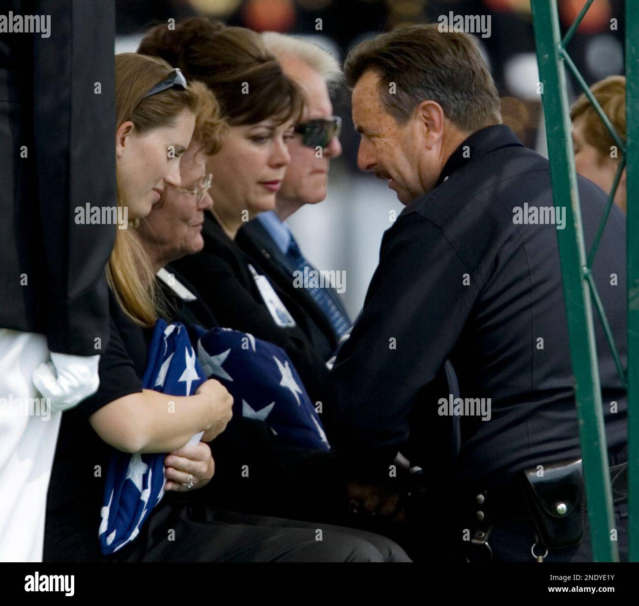 Los Angeles Police Department Chief Charlie Beck, right, consoles the ...